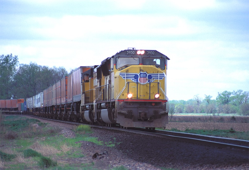 UP 3950 races east after crossing the Missouri River in western Iowa,